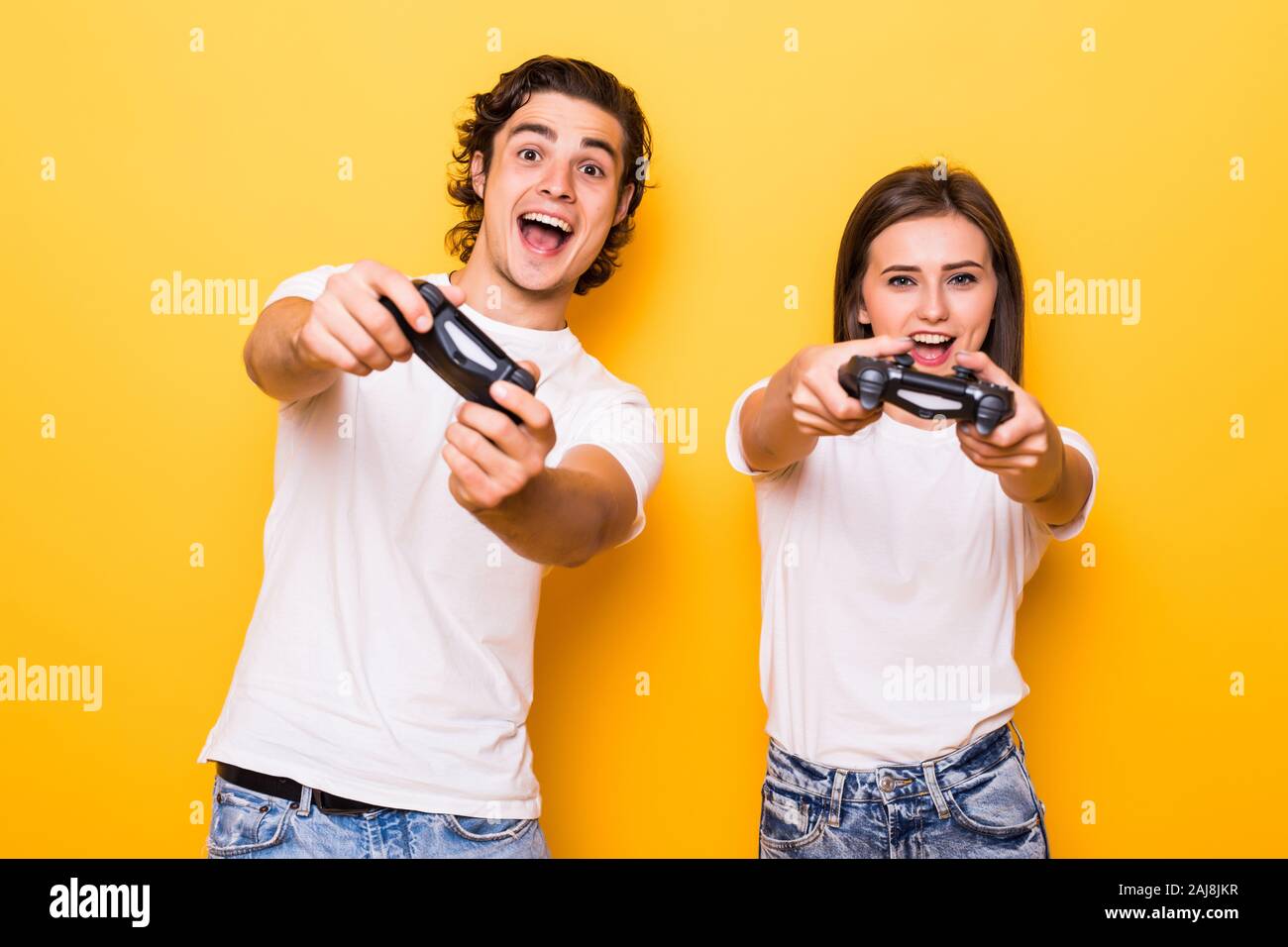 Photo of caucasian couple man and woman playing together video games ...