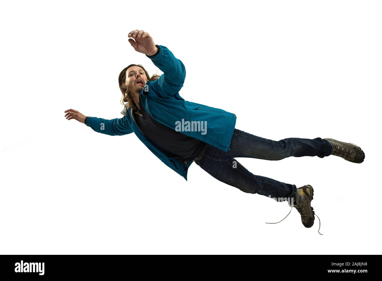 A second before falling. Caucasian young man falling down in moment ...