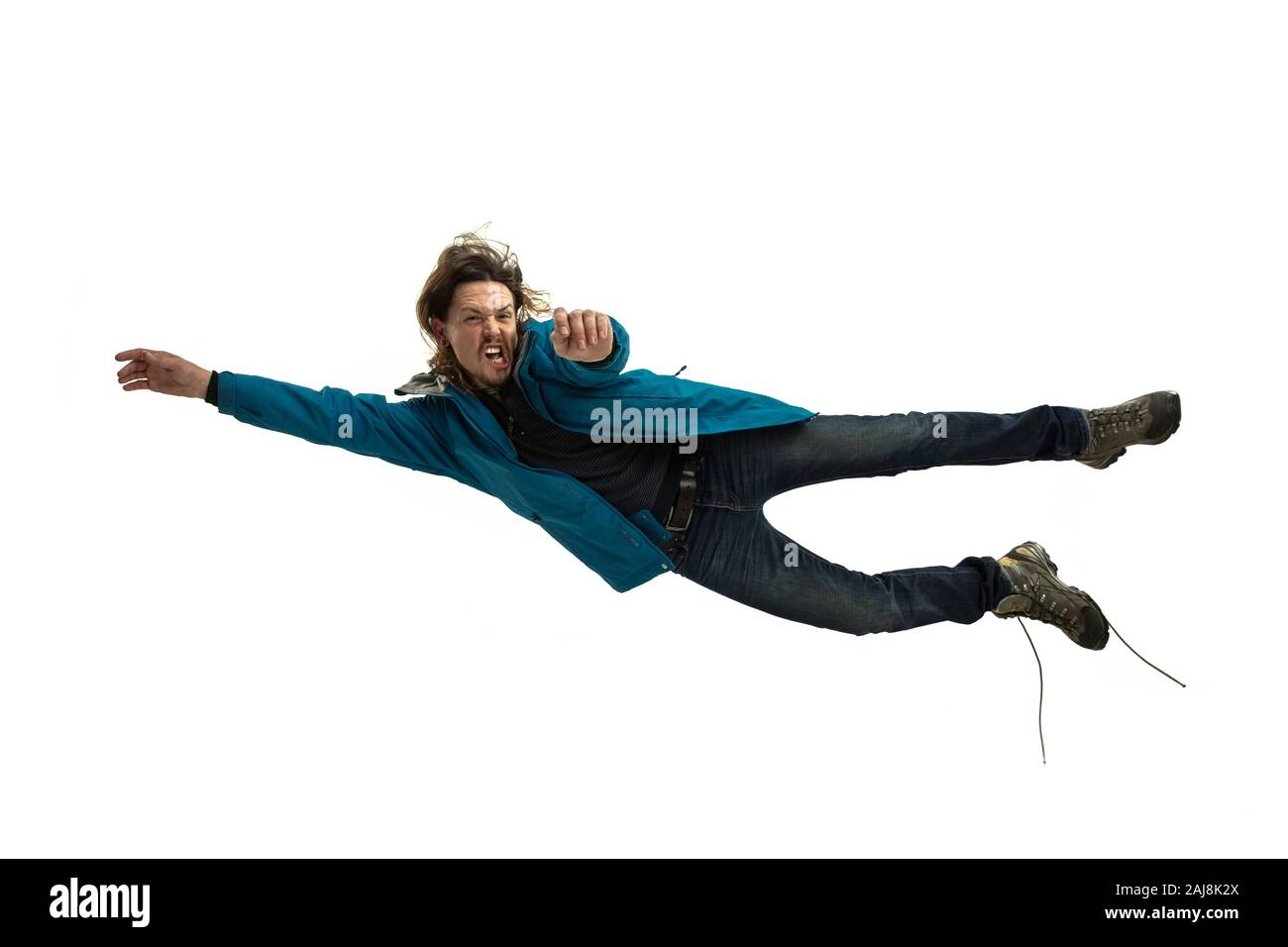 A second before falling. Caucasian young man falling down in moment ...