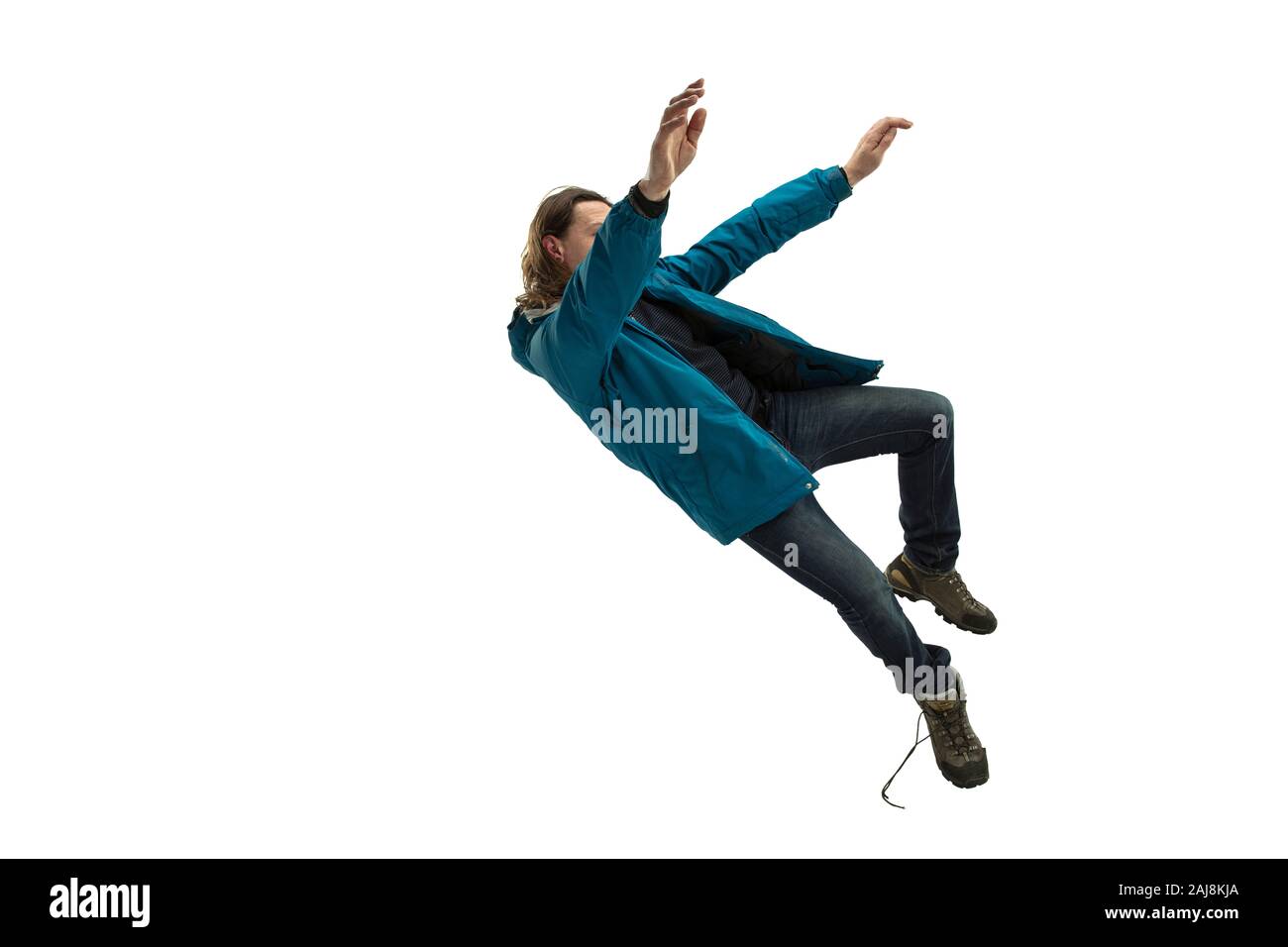 A second before falling. Caucasian young man falling down in moment ...