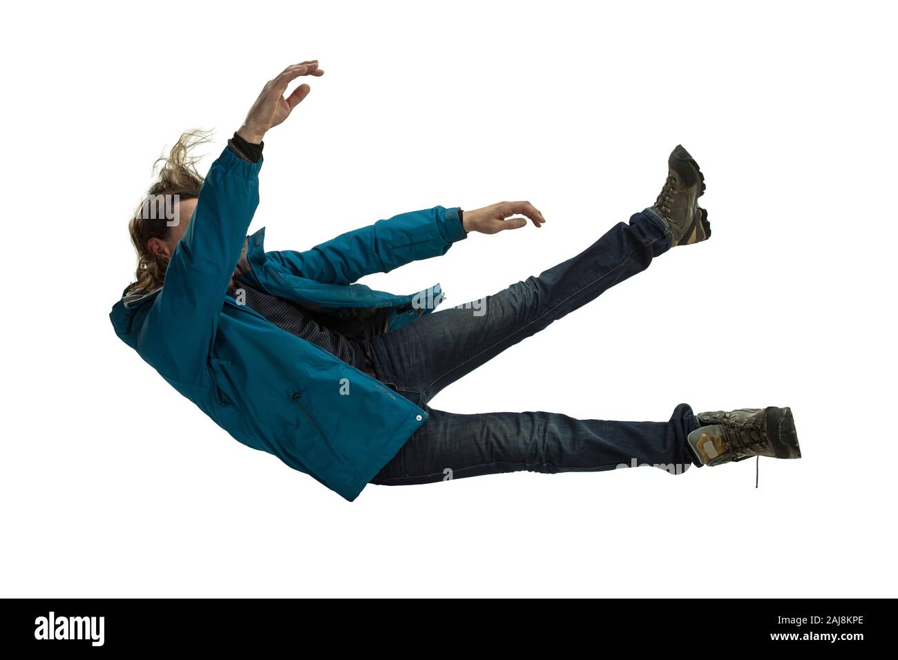 A second before falling. Caucasian young man falling down in moment ...