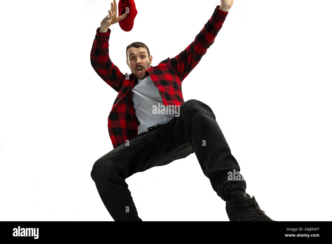 A second before falling. Caucasian young man falling down in moment ...