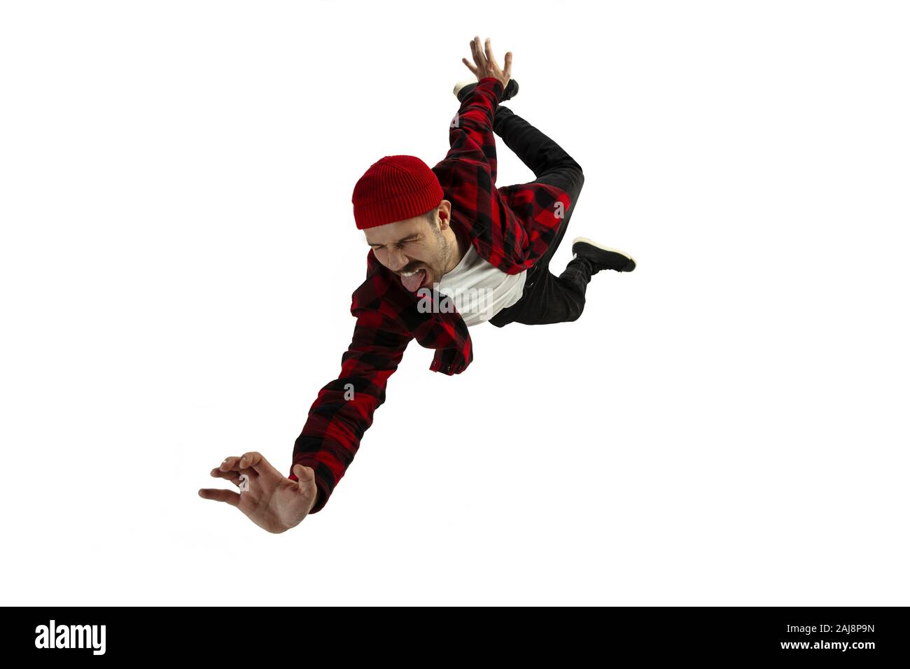 A second before falling. Caucasian young man falling down in moment ...