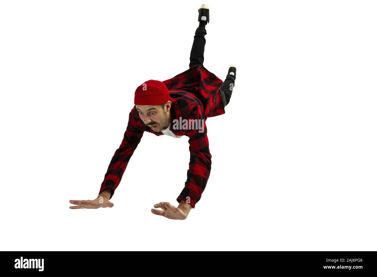 A second before falling. Caucasian young man falling down in moment ...