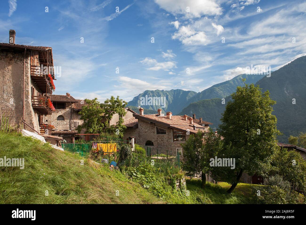 The medieval village of Canale di Tenno from Via al Lago, Trentino-Alto ...