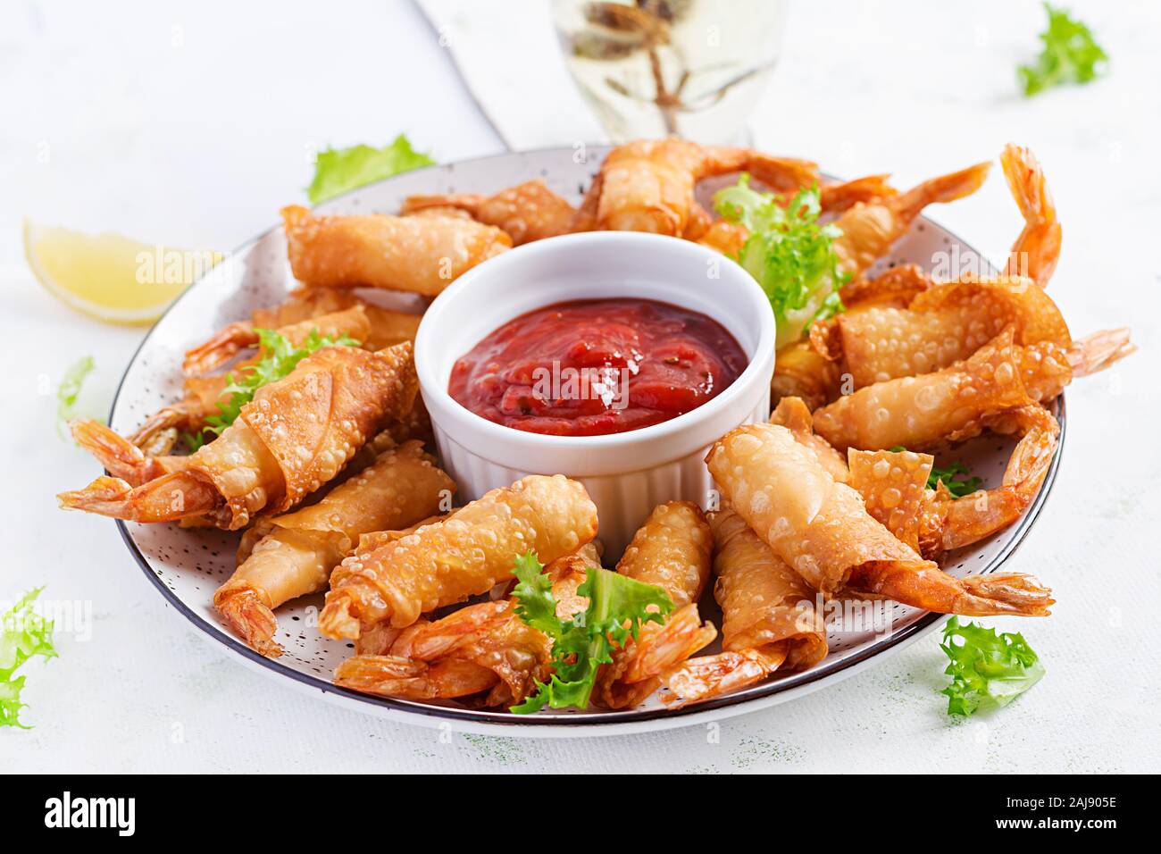 Shrimps with ginger in filo pastry with sweet and sour sauce. Thai ...