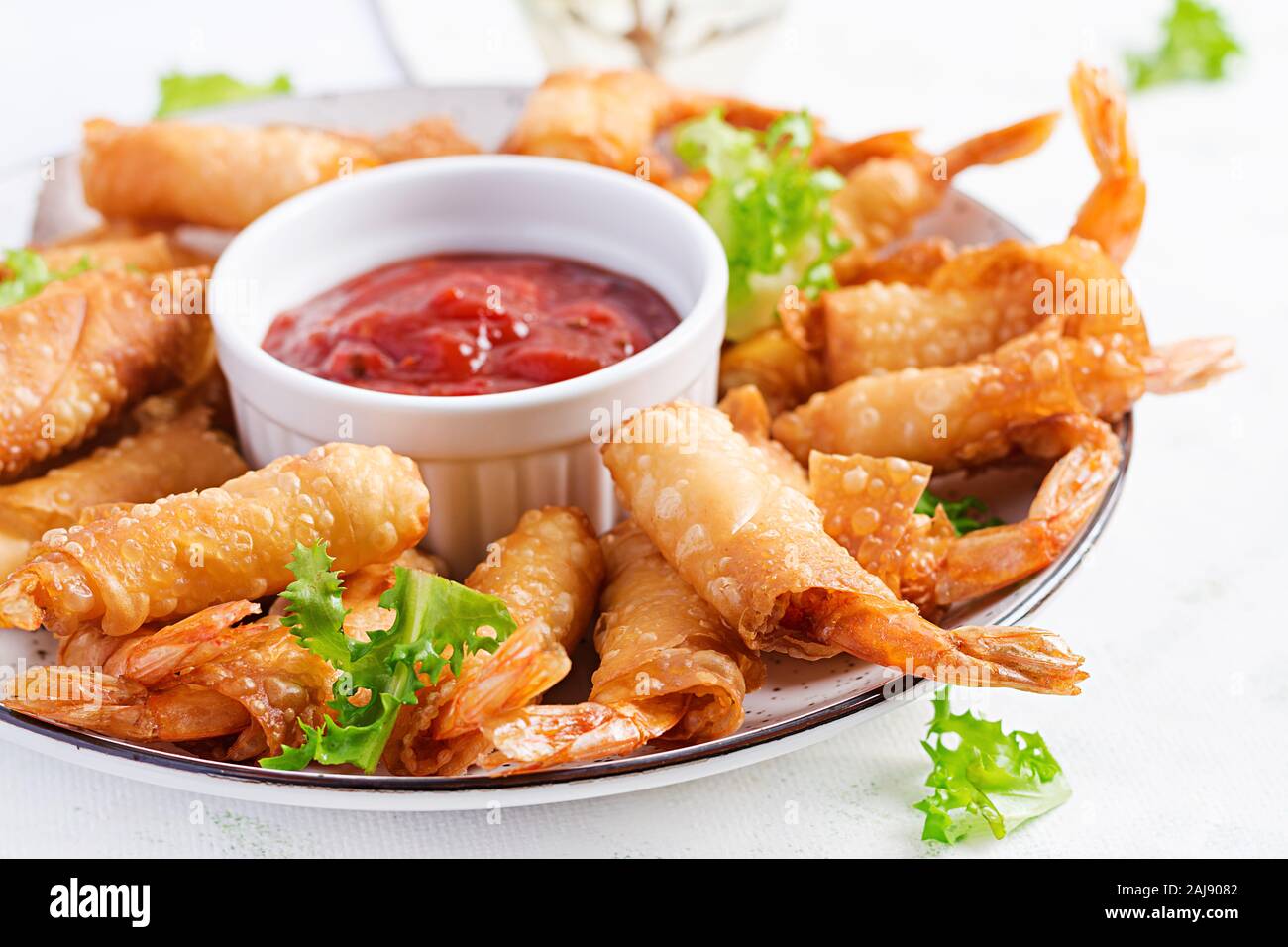 Shrimps with ginger in filo pastry with sweet and sour sauce. Thai ...