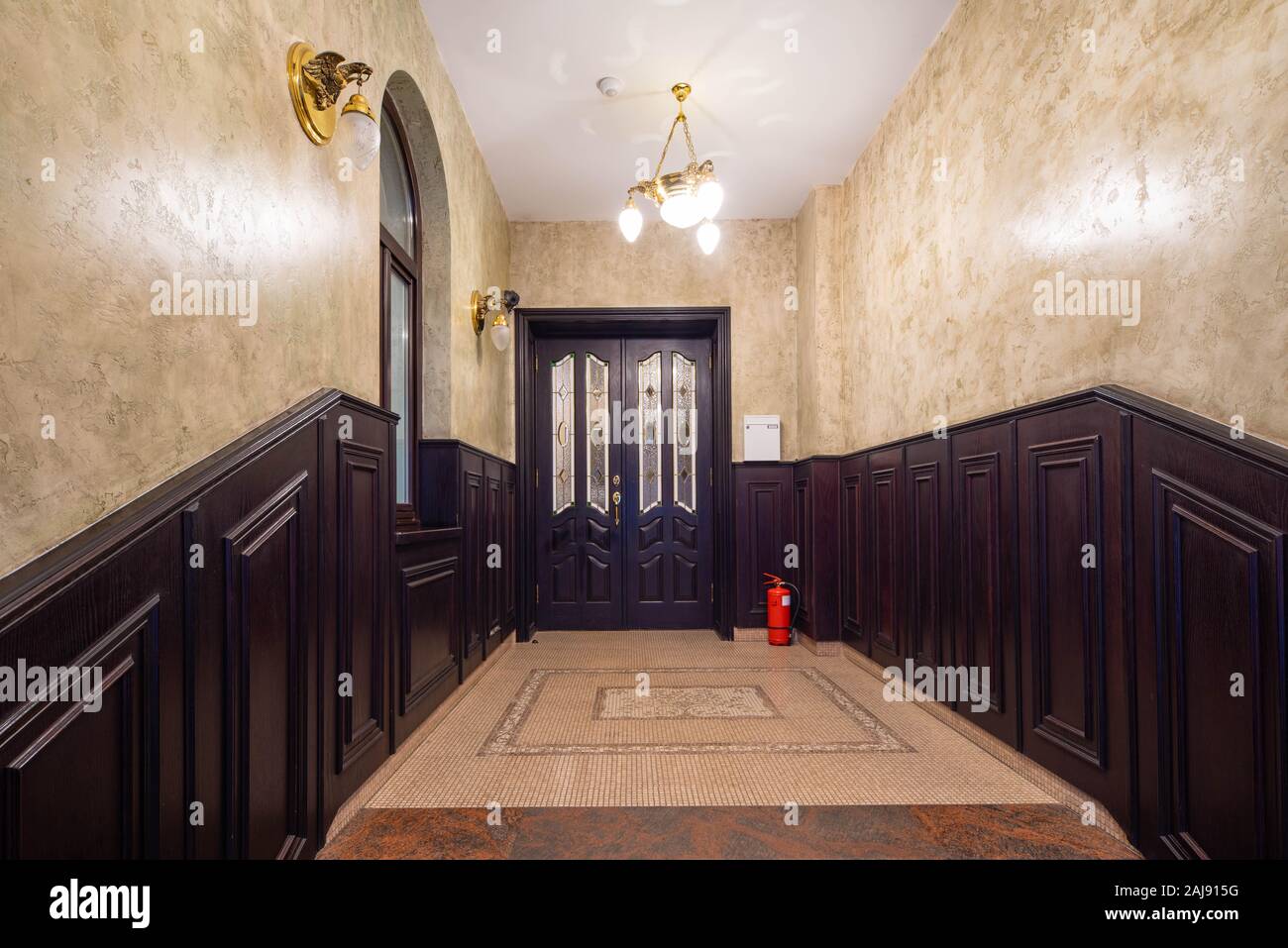 The interior of the entrance in a modern residential complex. Closed ...