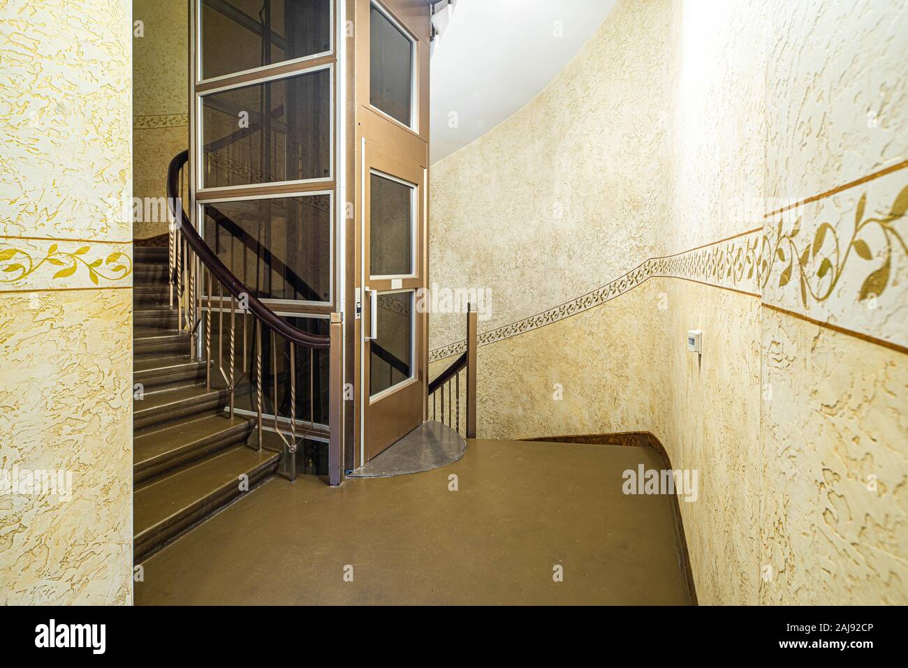 The interior of the entrance in a modern residential complex. Staircase ...