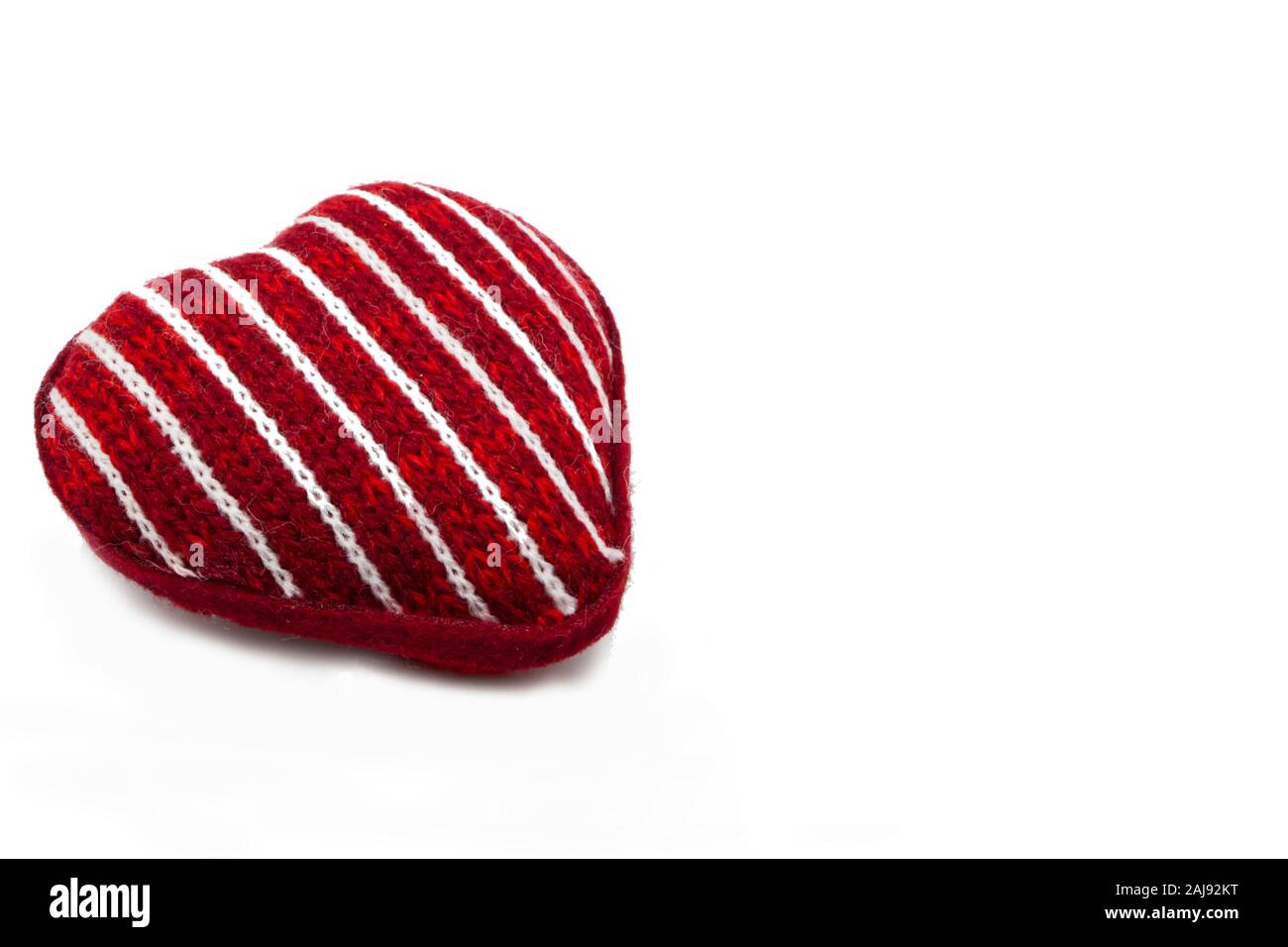 Red fabric heart with board to write, isolated on white. Happy ...