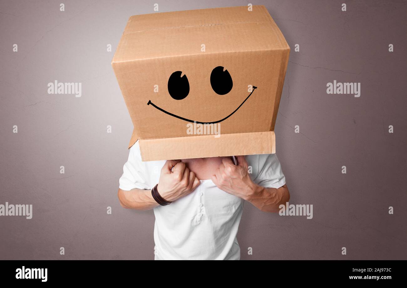 Man with cardboard box head Stock Photo - Alamy