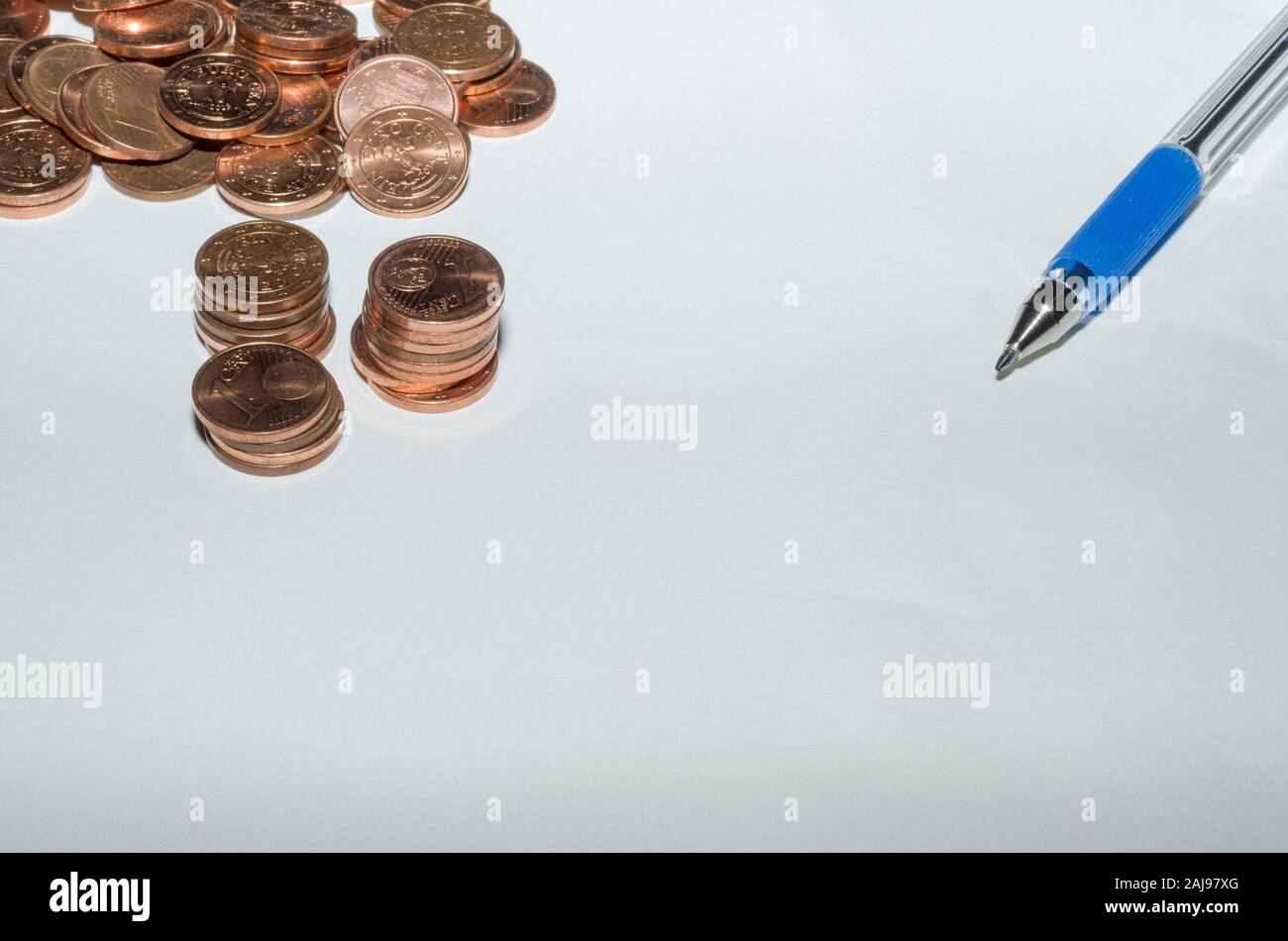 Background with coins and pen on top of a sheet of paper Stock Photo ...