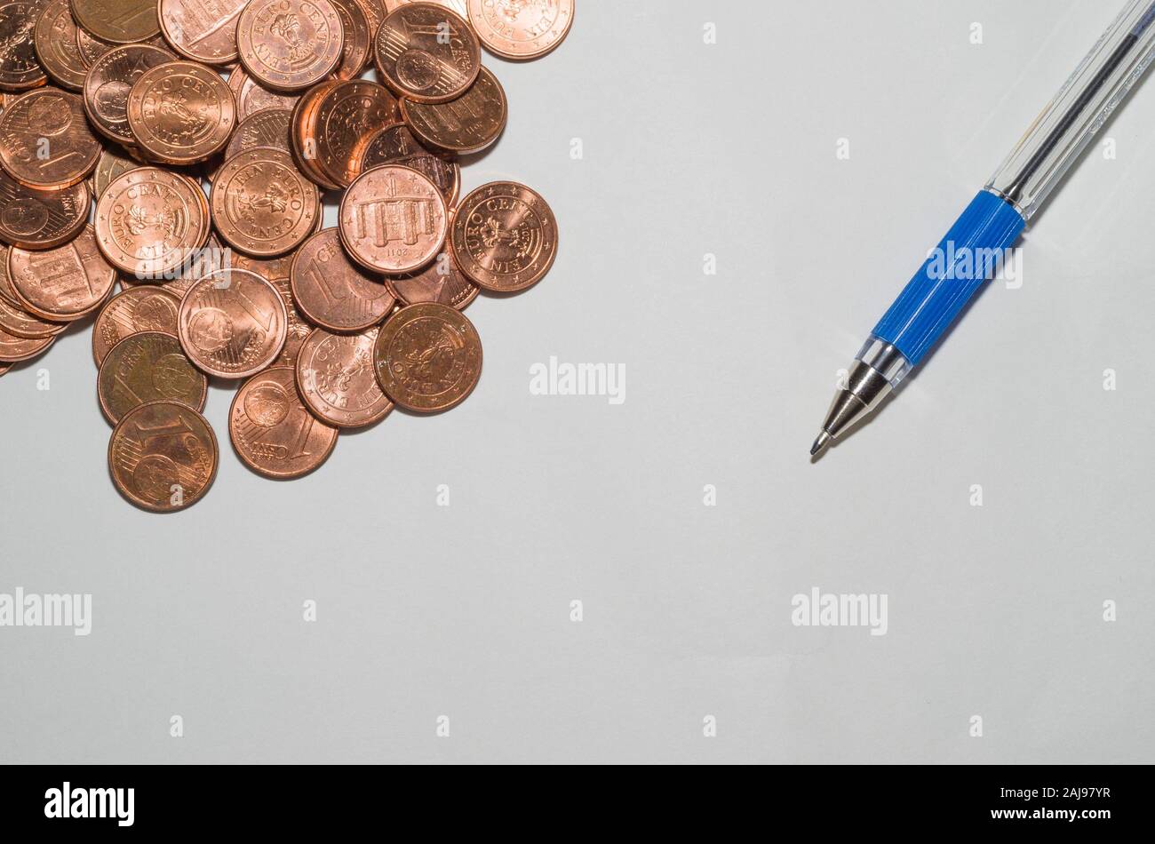 Background with coins and pen on top of a sheet of paper Stock Photo ...