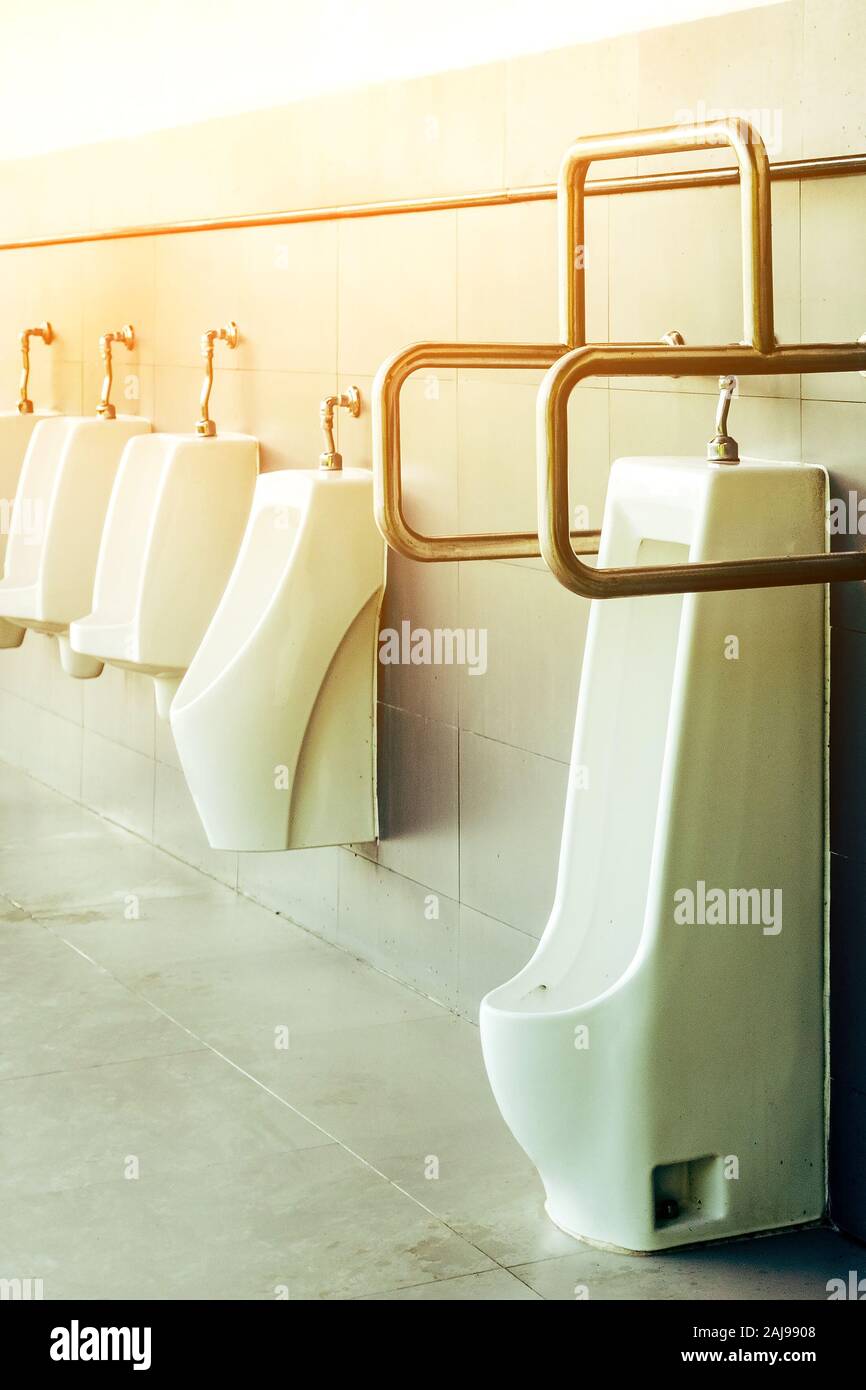 Clean and modern public men toilet with friendly design for people with ...