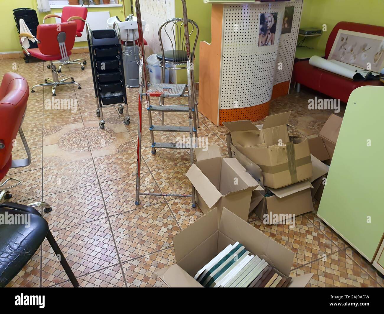 Repair work in a beauty salon. Tiling and turning off lights ...
