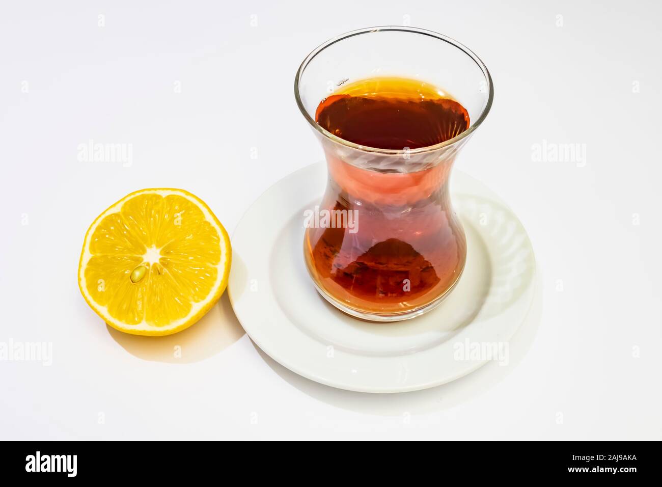 traditional turkish tea and half lemon Stock Photo - Alamy