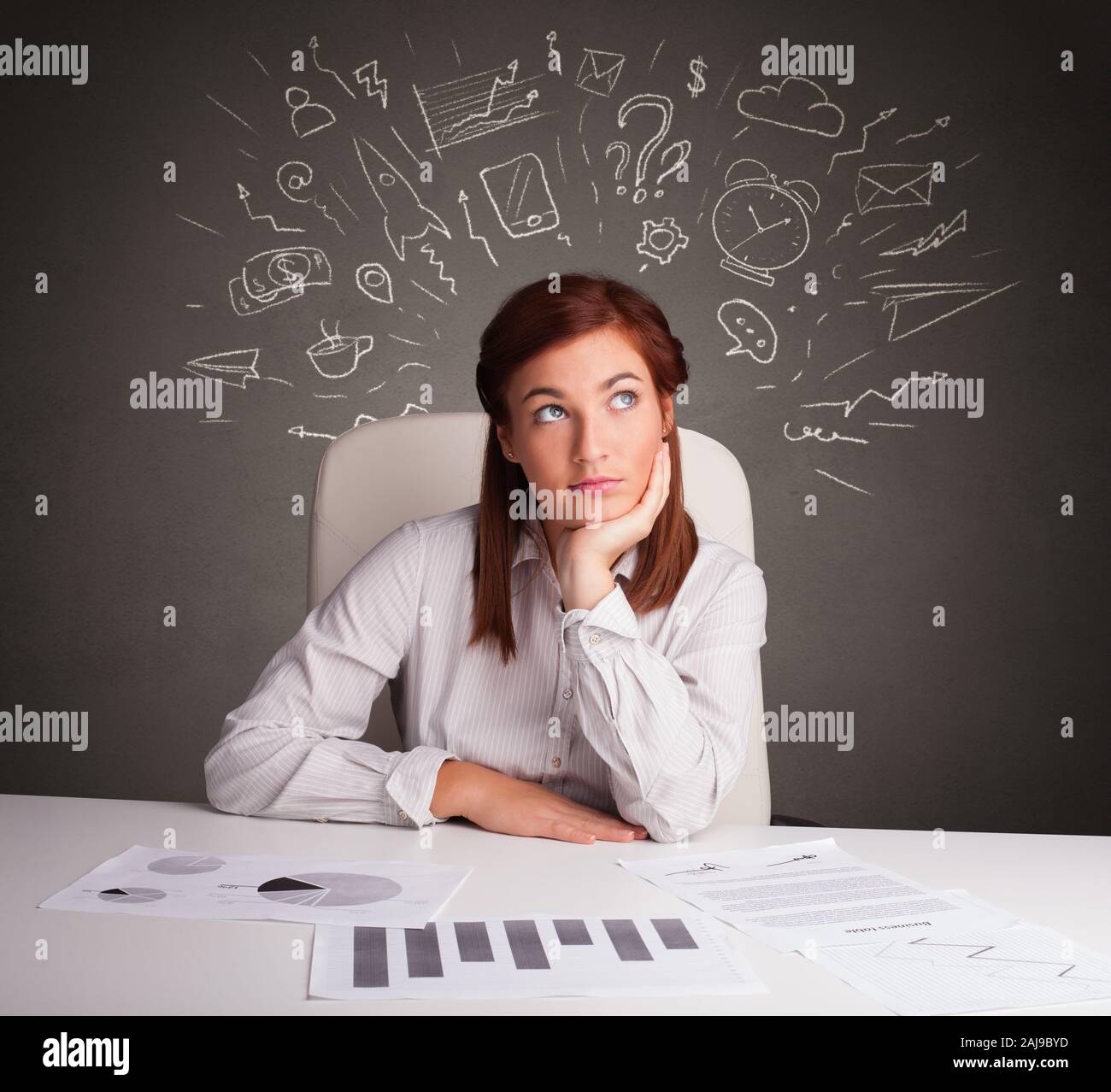 Manager in front of the office desk with different direction concept ...