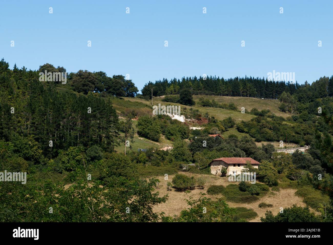 typical house in the hills in the basque country Stock Photo - Alamy