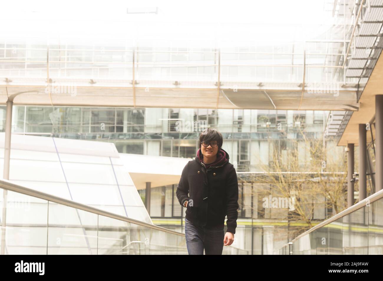 One young man walking outside hi-res stock photography and images - Alamy
