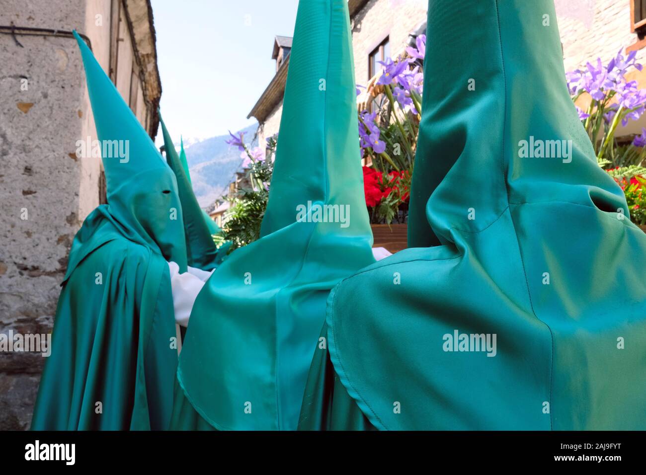 Hooded penitents during procession Stock Photo - Alamy