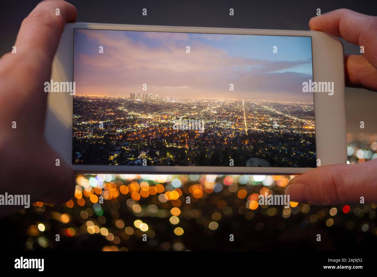 Hand holding phone down hi-res stock photography and images - Alamy