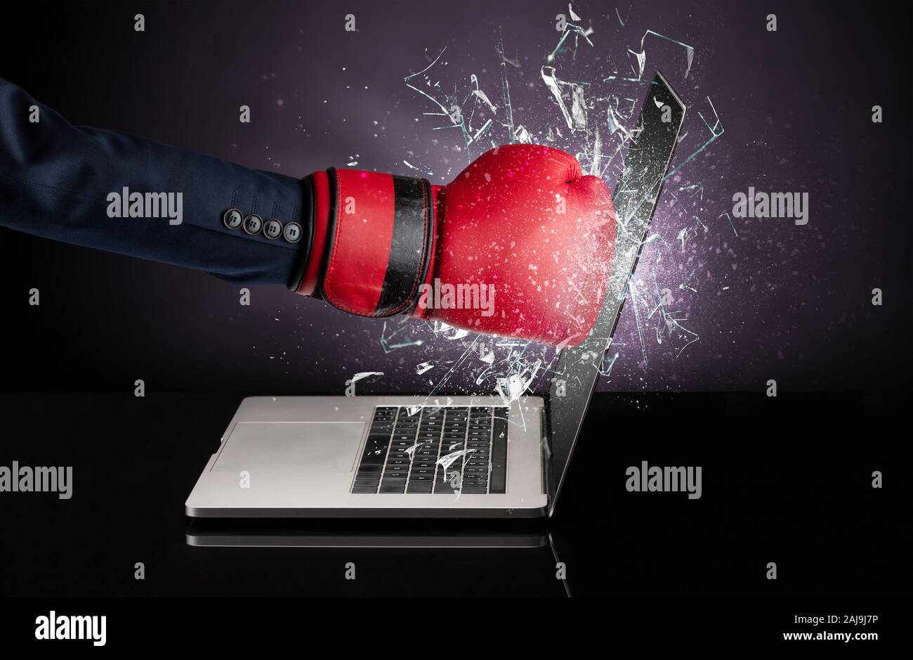 Hand hitting strongly laptop screen glass Stock Photo - Alamy
