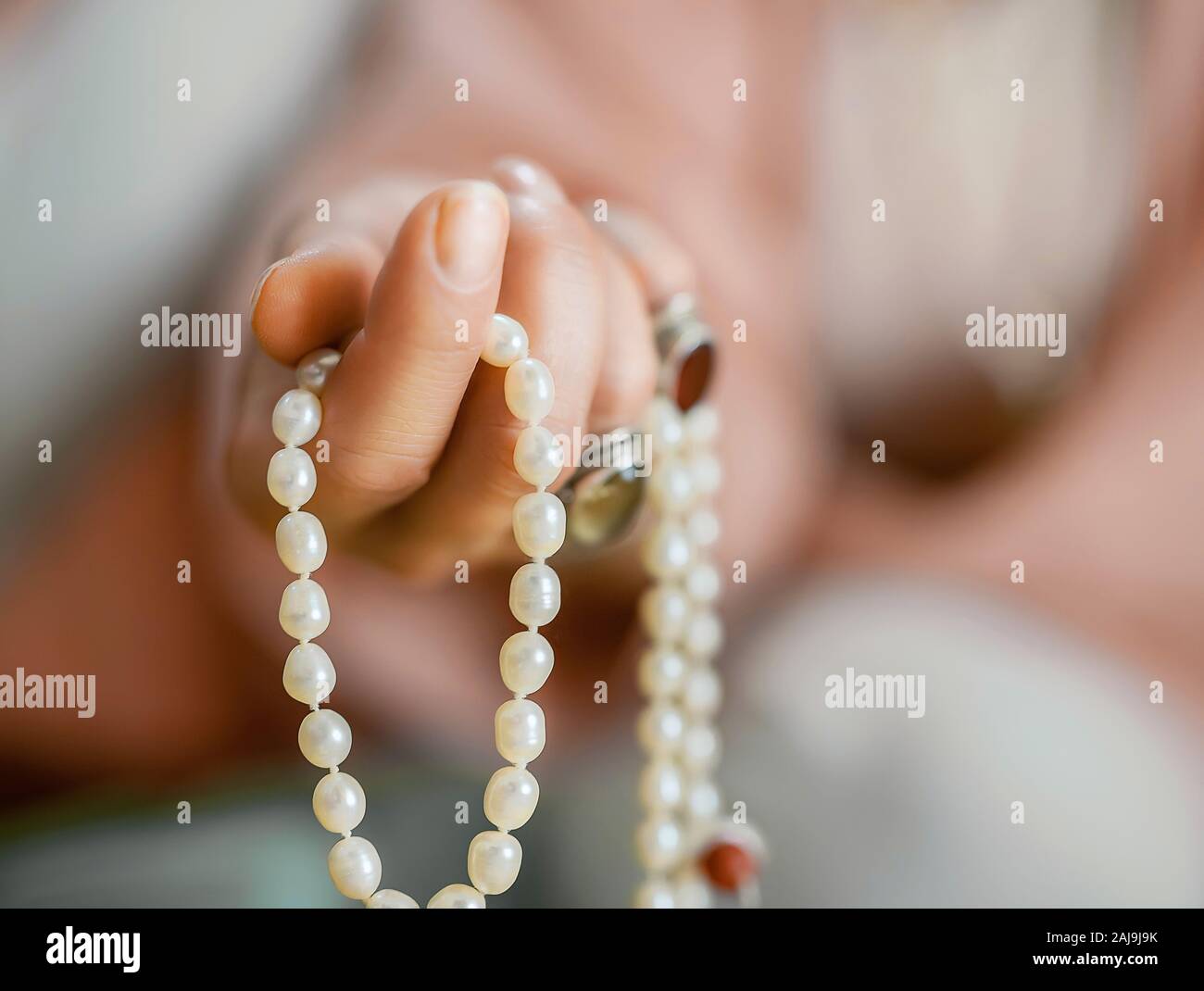 Pearl rosary hi-res stock photography and images - Alamy