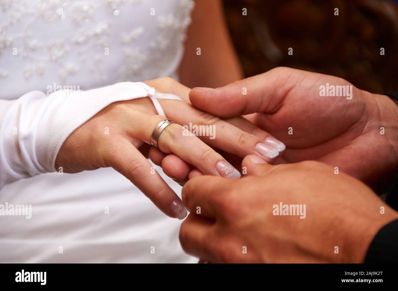ring changing ceromony while wedding Stock Photo - Alamy