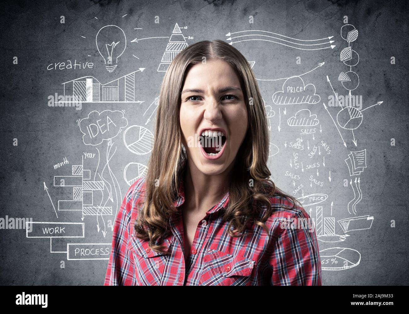 Frenzied young woman screaming with anger. Financial charts and ...