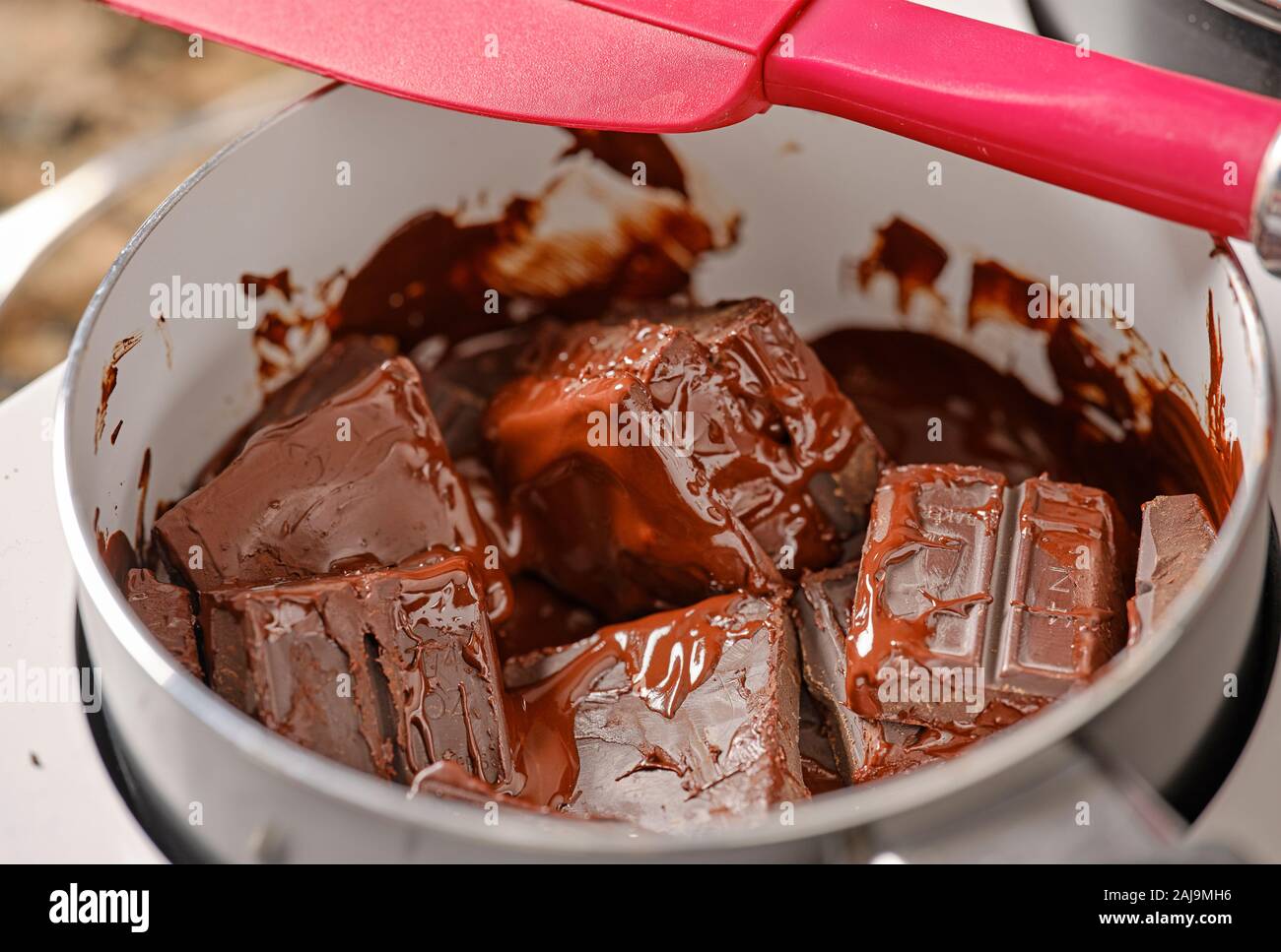 Chocolate making using a bain marie Stock Photo - Alamy