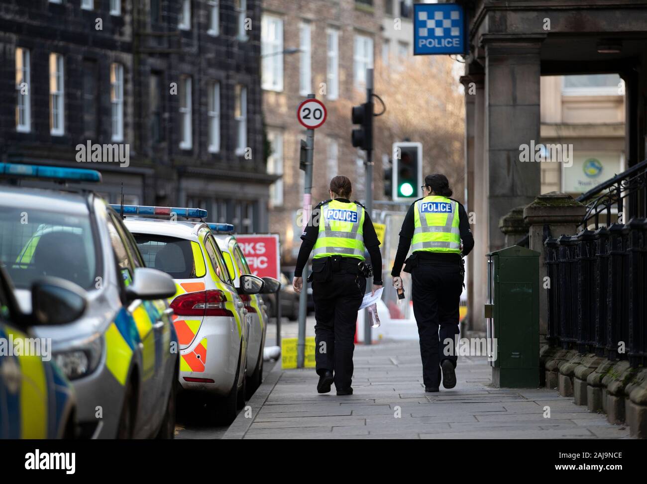 Police officers outside the Police Scotland Leith station in Edinburgh ...