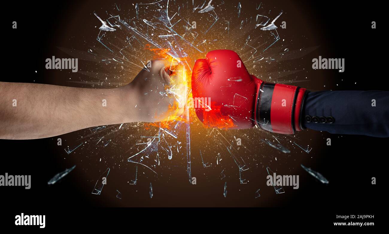 Two hands fighting and breaking a glass into small pieces Stock Photo ...