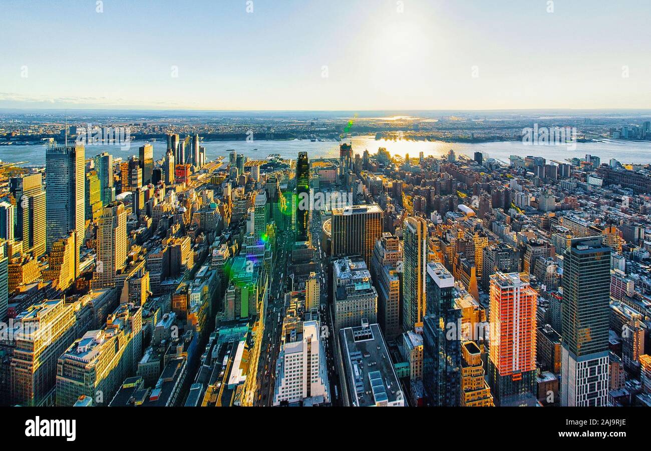 Aerial view to Midtown district of New York City reflex Stock Photo - Alamy