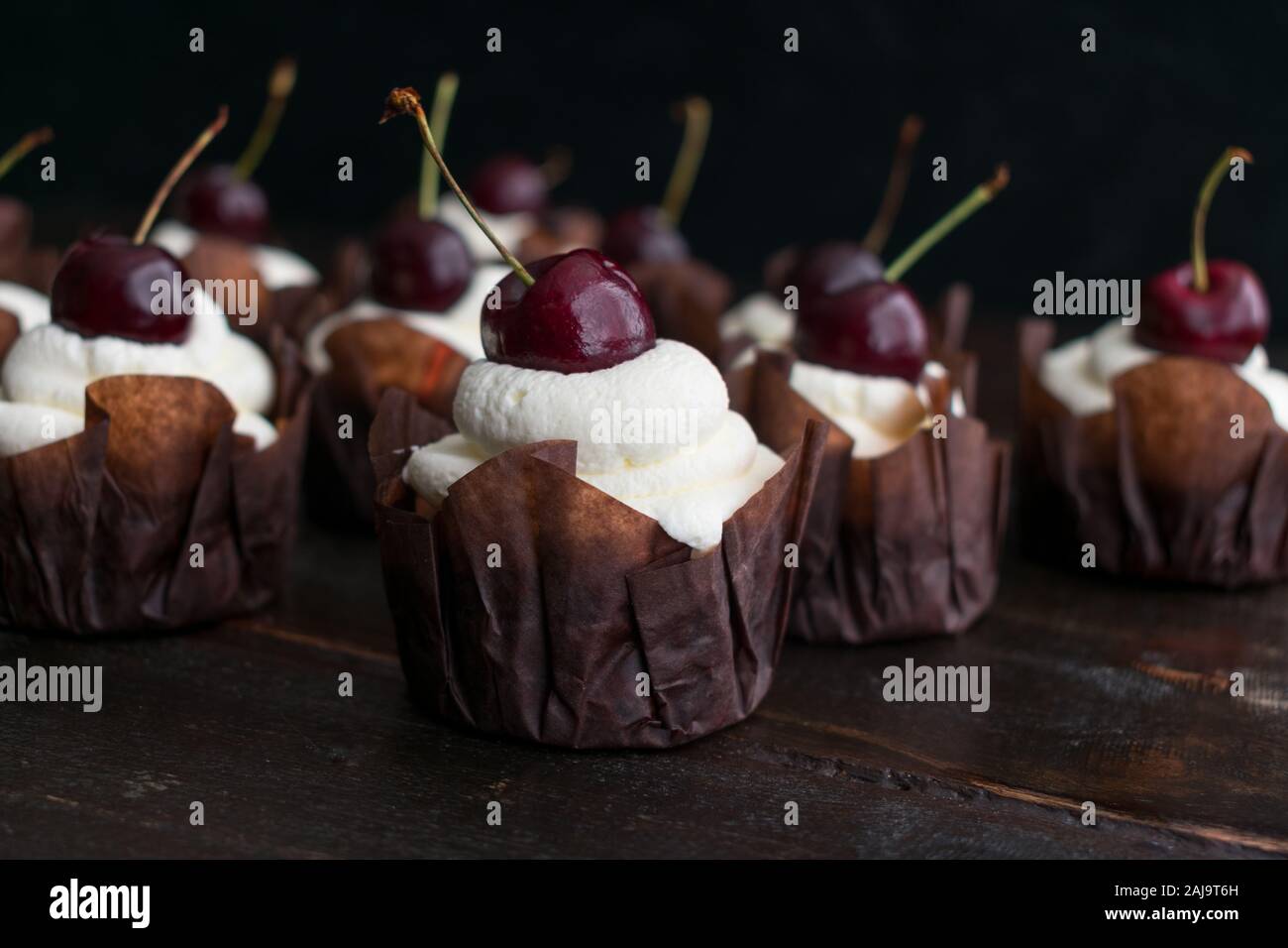 Black Forest Cupcakes with Cherry Topping: Chocolate cupcakes topped ...
