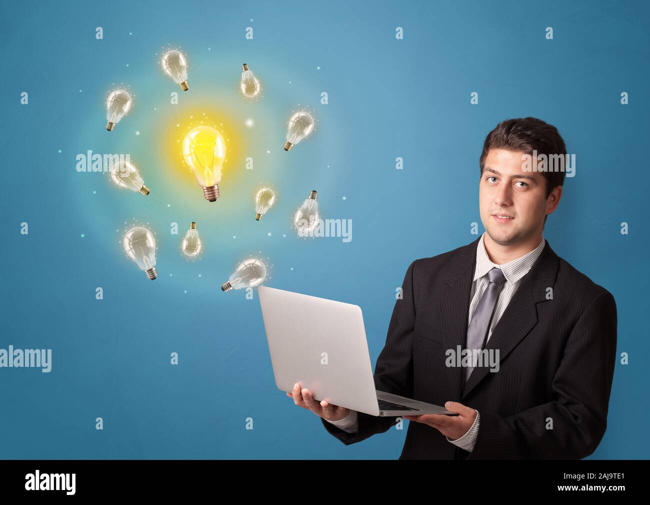 Young smiling person presenting new idea concept Stock Photo - Alamy