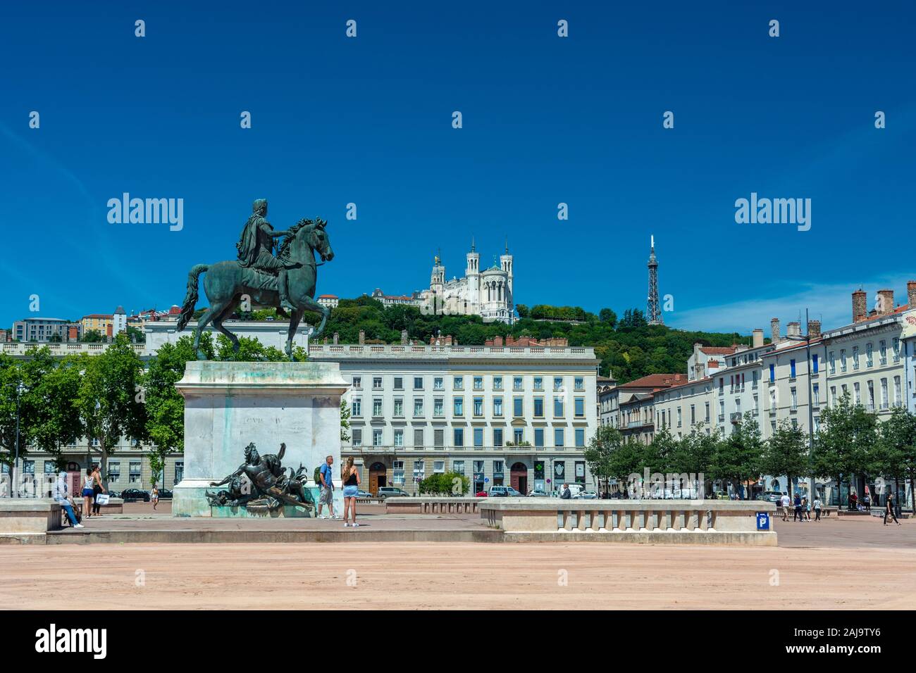 Lyon, France - July 18, 2018: The Bellecour square in Lyon with Statue ...