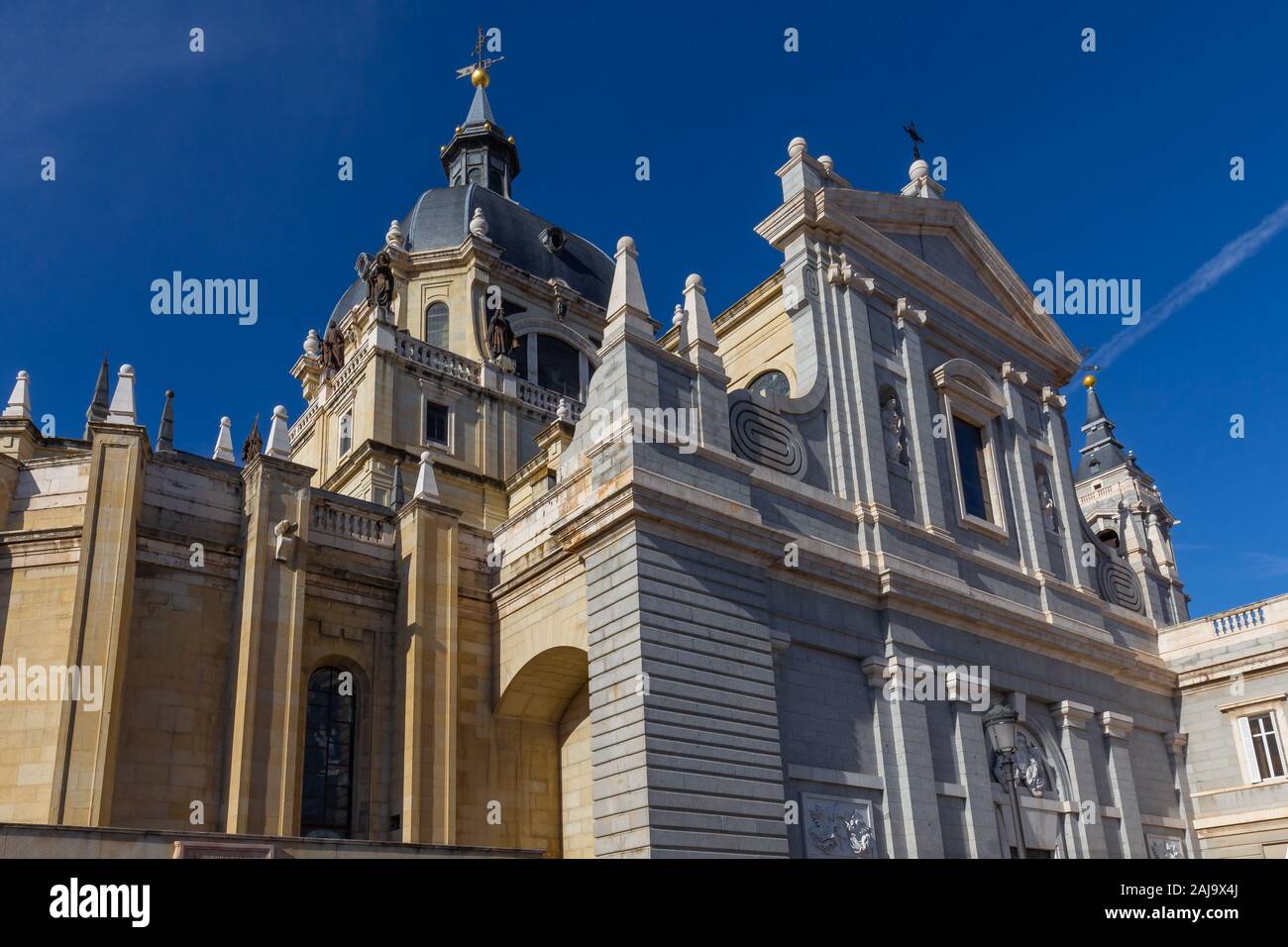 Partial view of the 17th century Almudena Cathedral a Catholic church ...