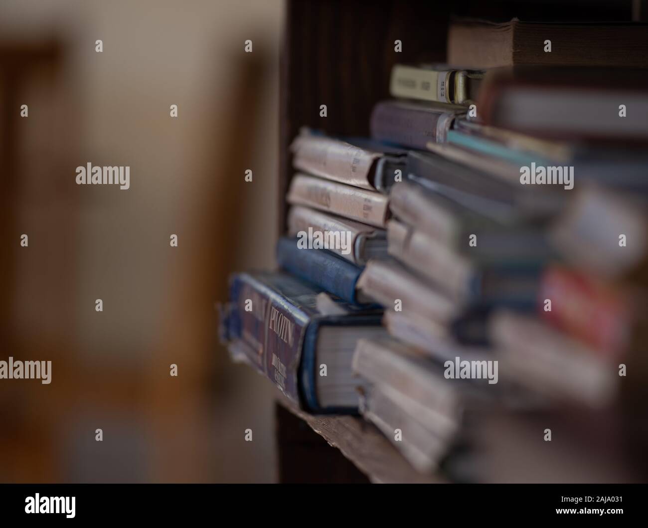 Still Life of a Stack of Books on a Shelf Stock Photo - Alamy