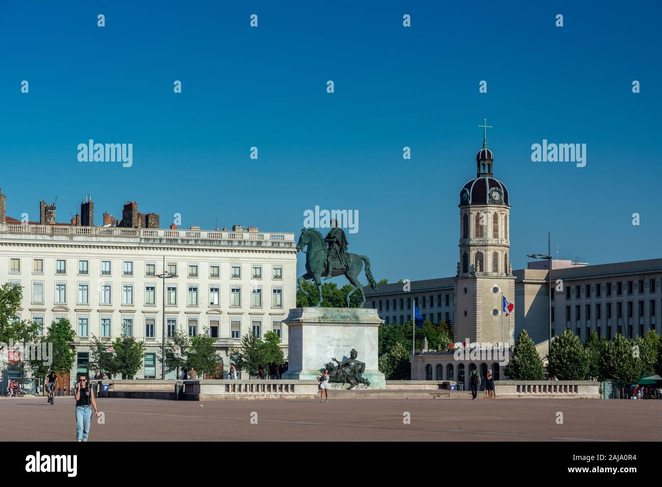 Lyon, France - July 19, 2018: The Bellecour square in Lyon with Statue ...