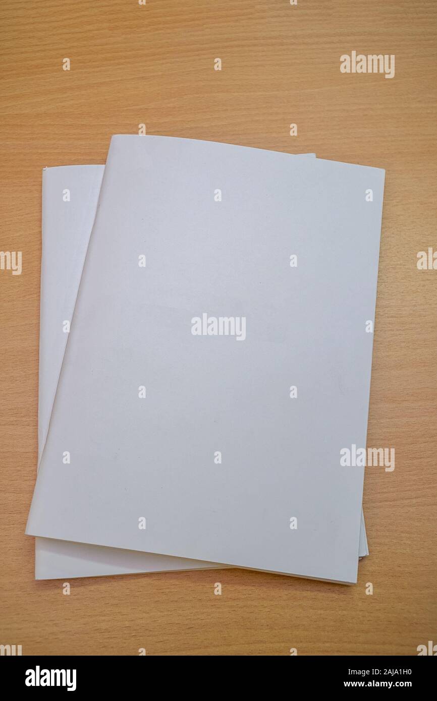 Blank brochure form with a clear title page for your project on a ...