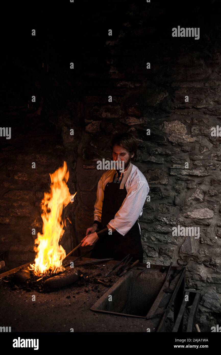 Blacksmith at Sovinec Castle, and his craft presentation Stock Photo ...