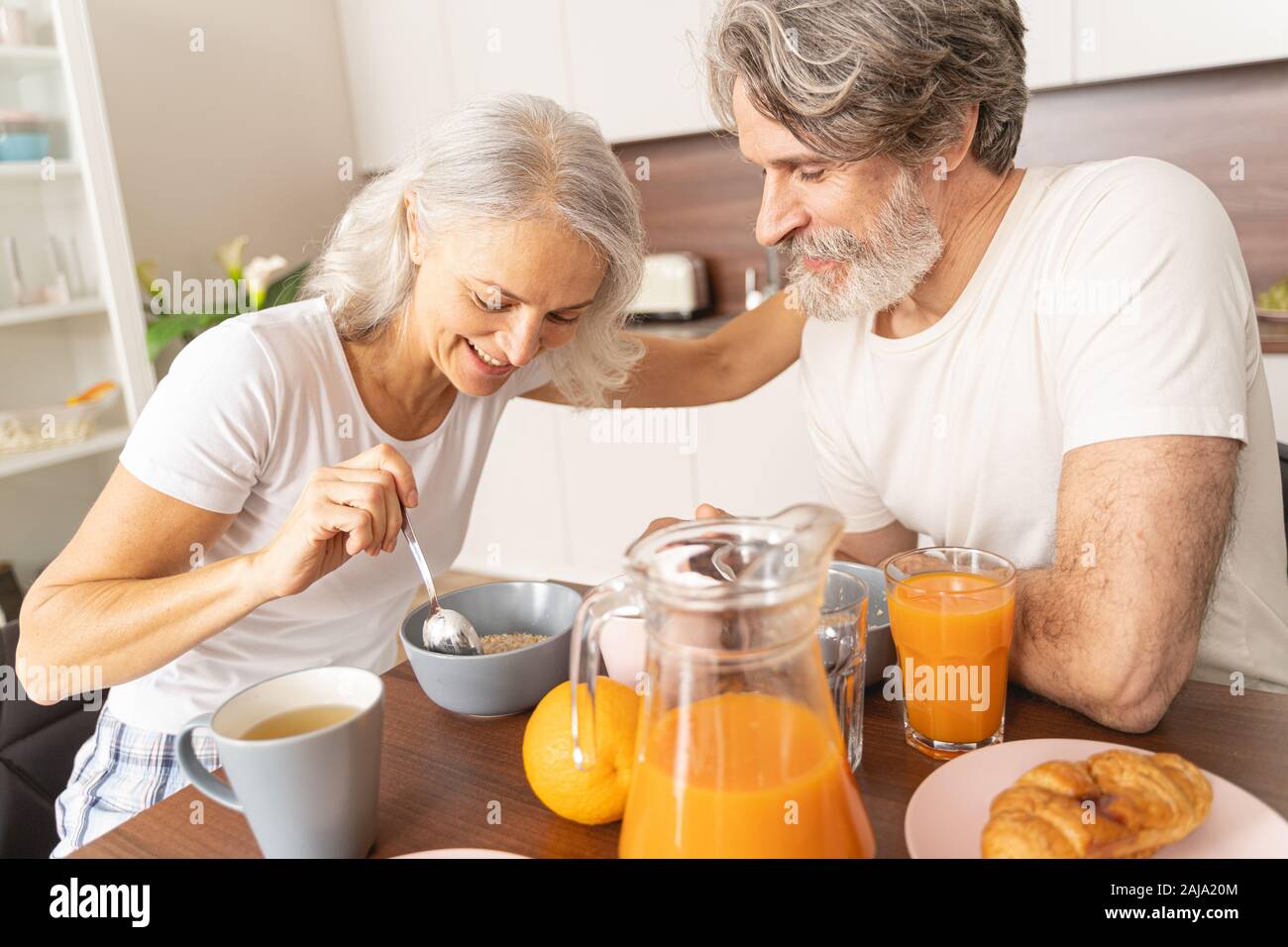 Wife eating porridge husband hi-res stock photography and images - Alamy