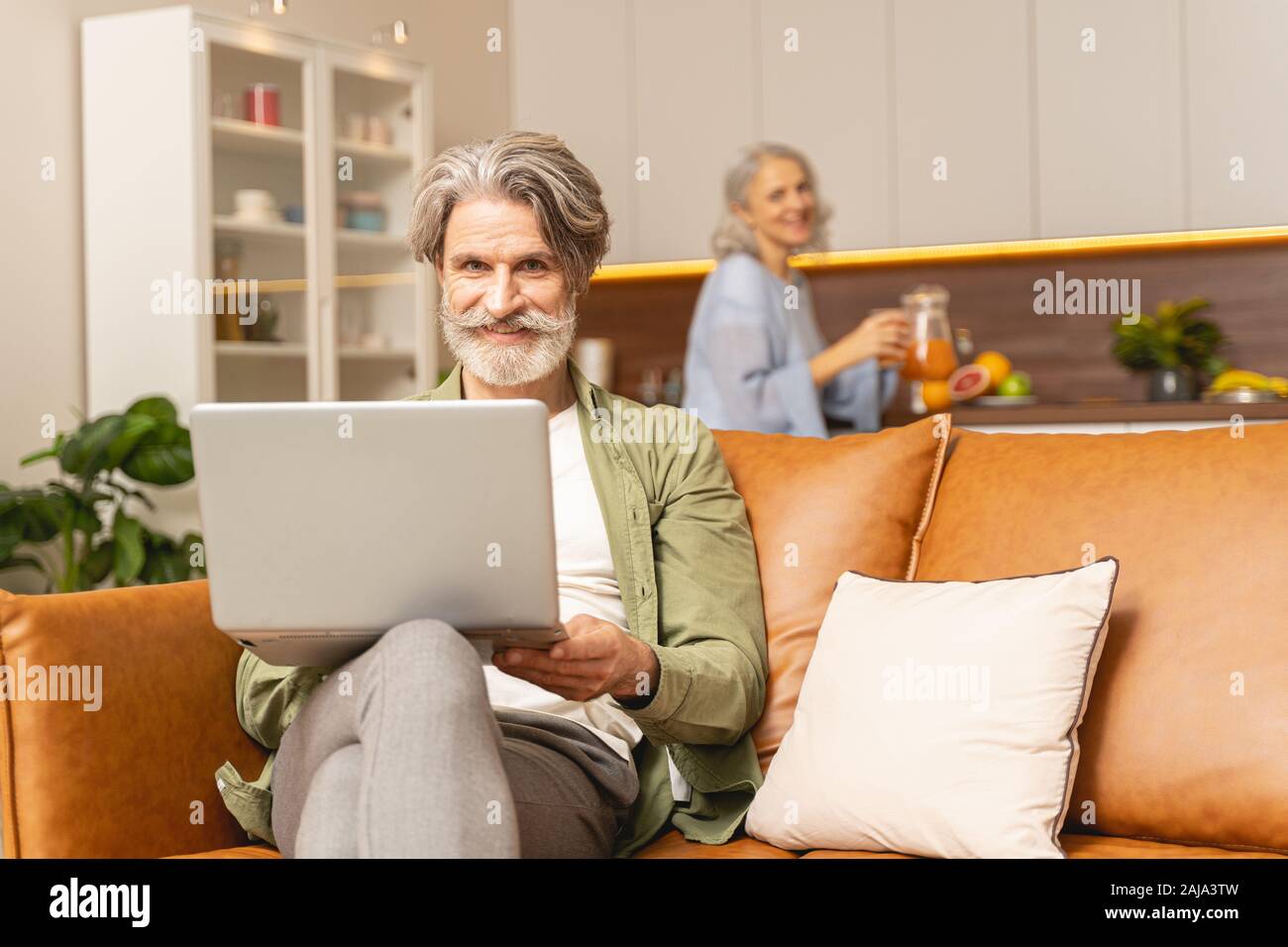 Modern attentive man looking in front of him Stock Photo - Alamy