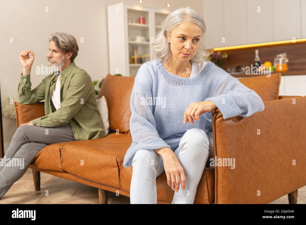 Sad mature male looking into the distance Stock Photo - Alamy