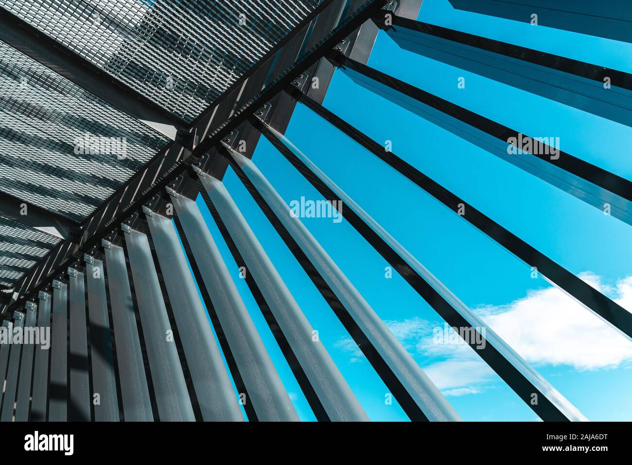 Reflections of the sun entering a corridor of a modern architecture ...