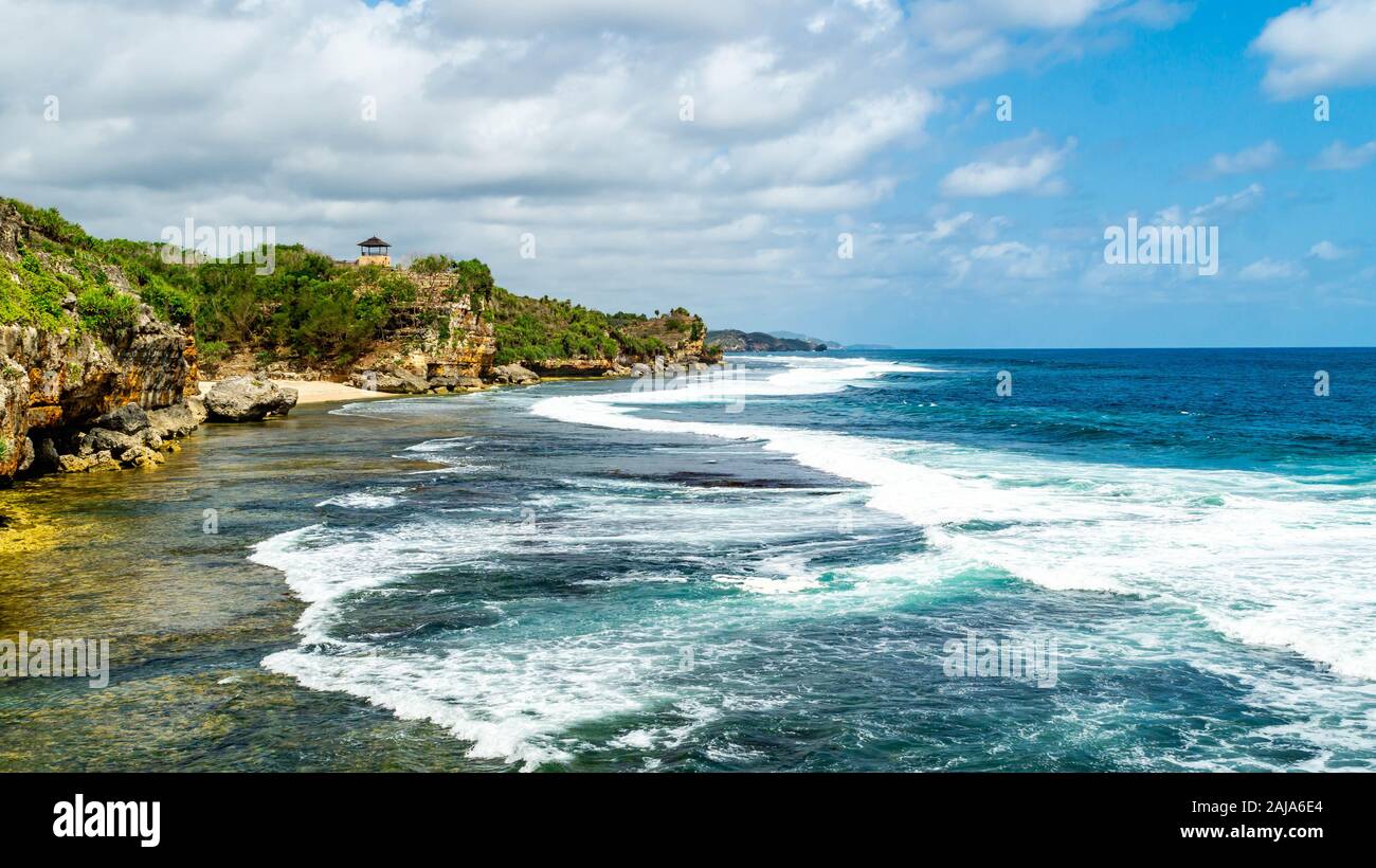 beautiful scenery of rocjy beach at Kukup beach, Gunung Kidul ...