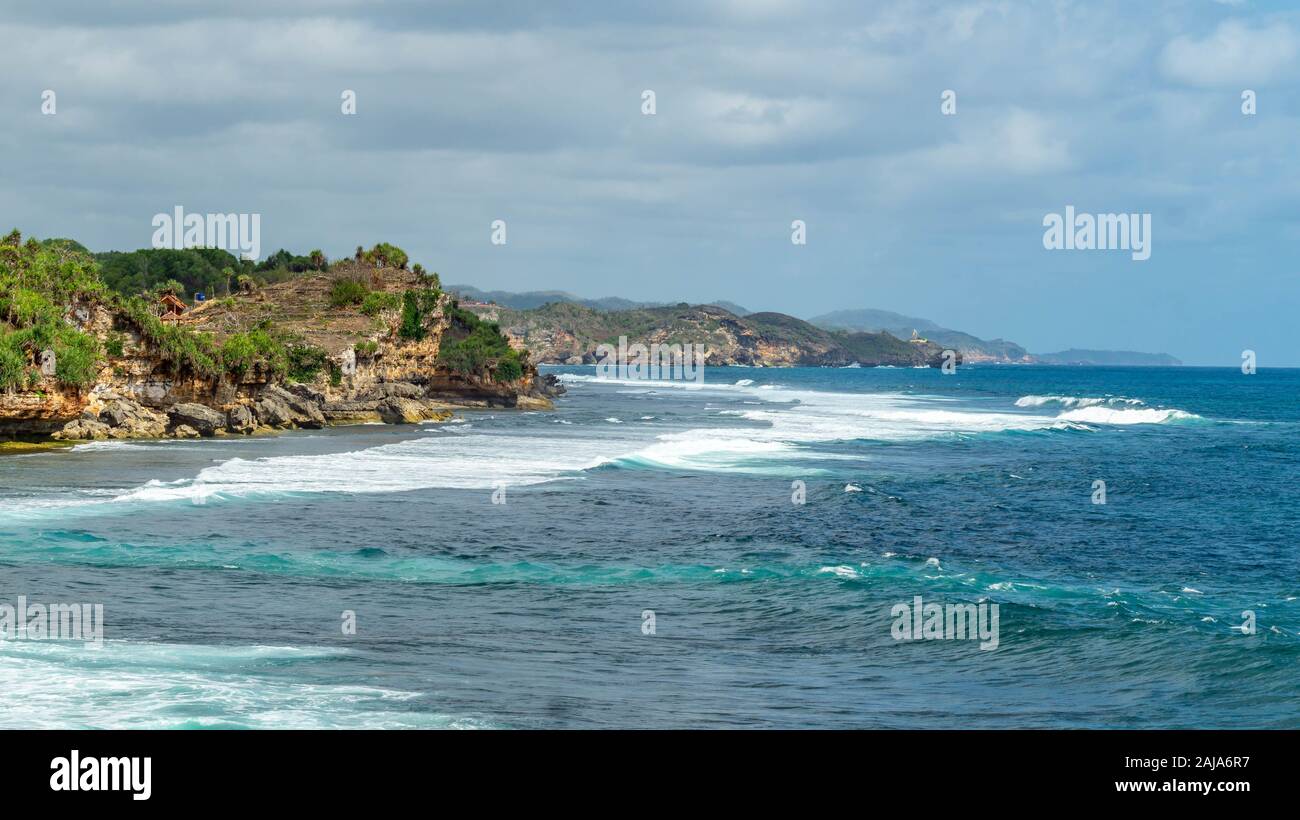 beautiful scenery of rocjy beach at Kukup beach, Gunung Kidul ...