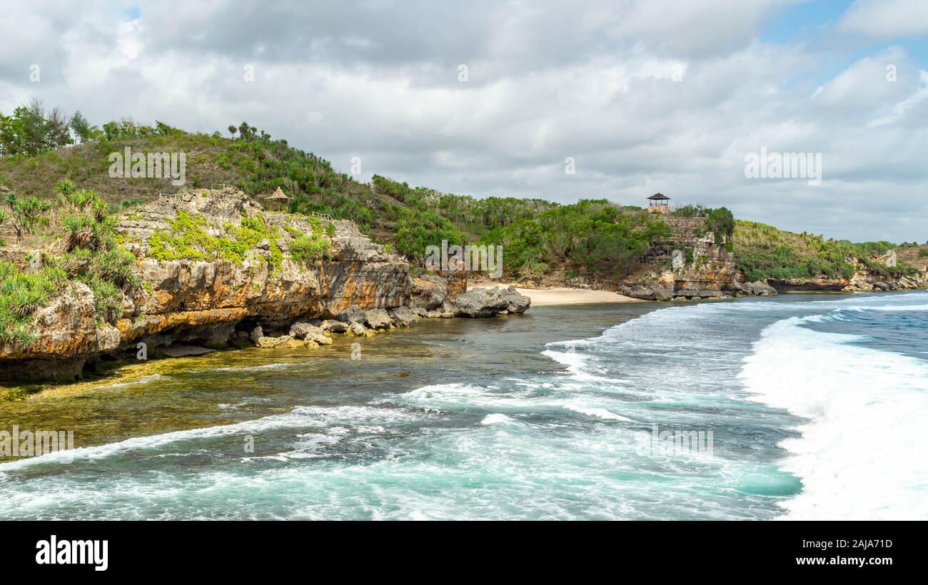 beautiful scenery of rocjy beach at Kukup beach, Gunung Kidul ...