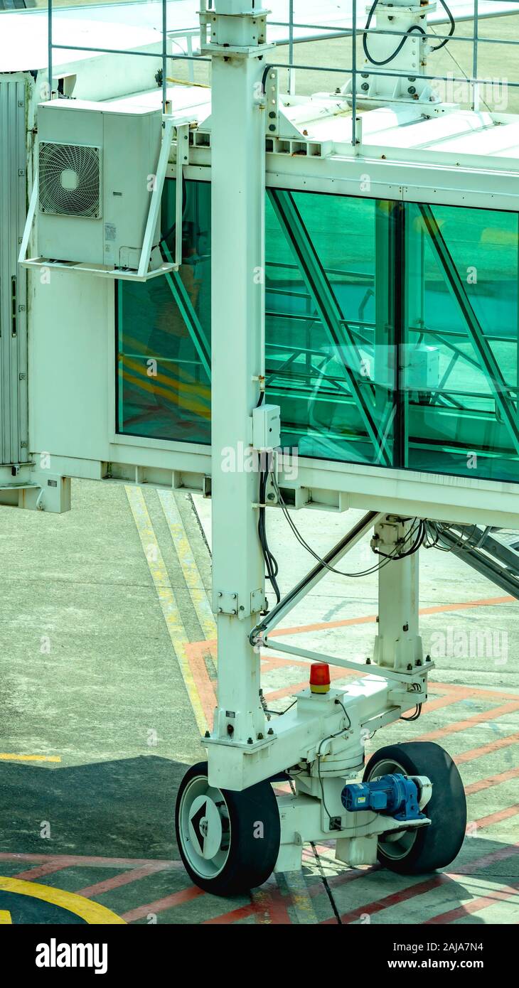 Passenger boarding bridge at the airport Stock Photo - Alamy