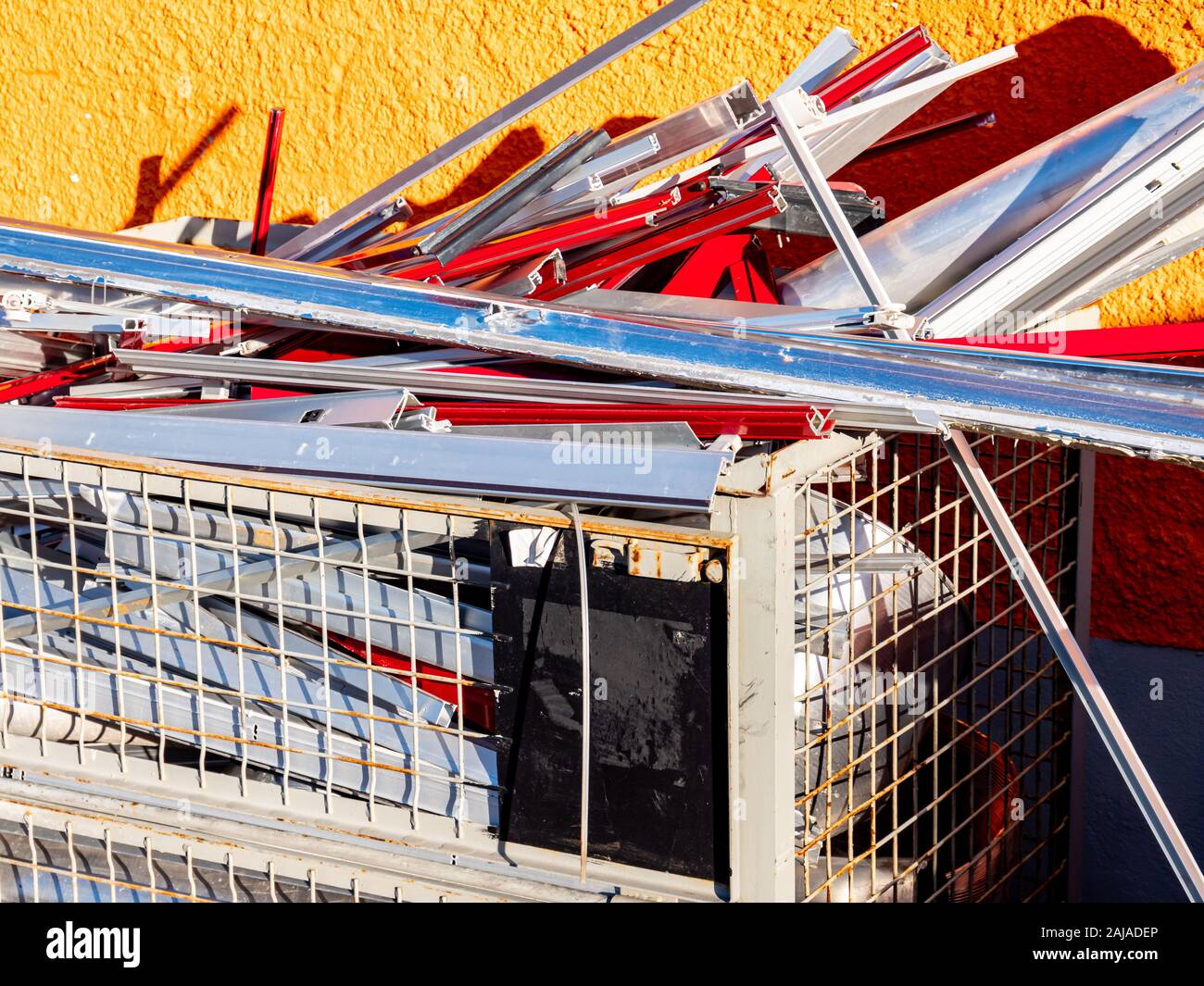 Scrap metal in a container Stock Photo - Alamy